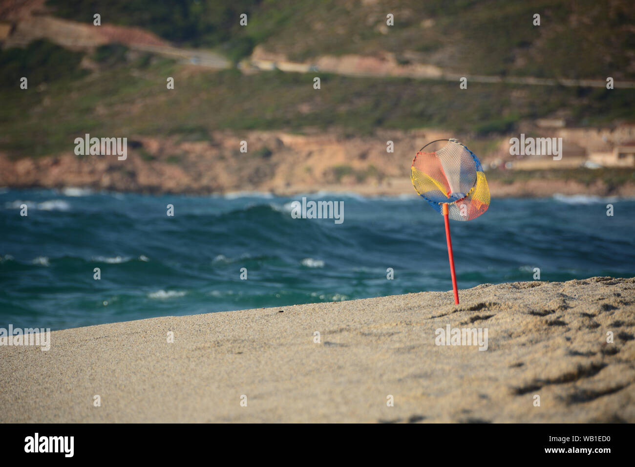 fishing net used by children to catch small fish in shallow wate Stock ...