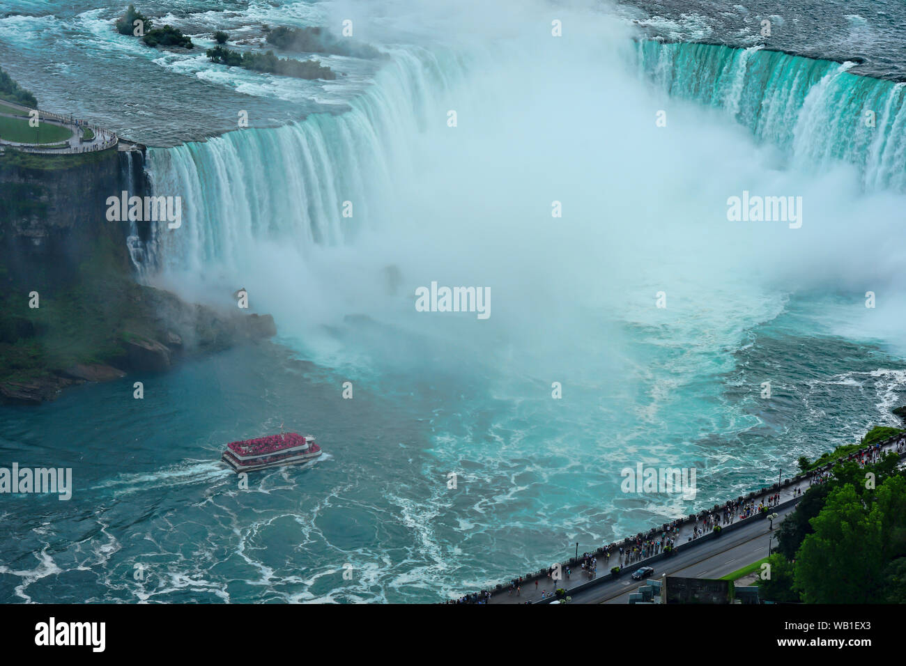 Hornblower Boat at the Niagara Falls in the summer with downtown fun ...
