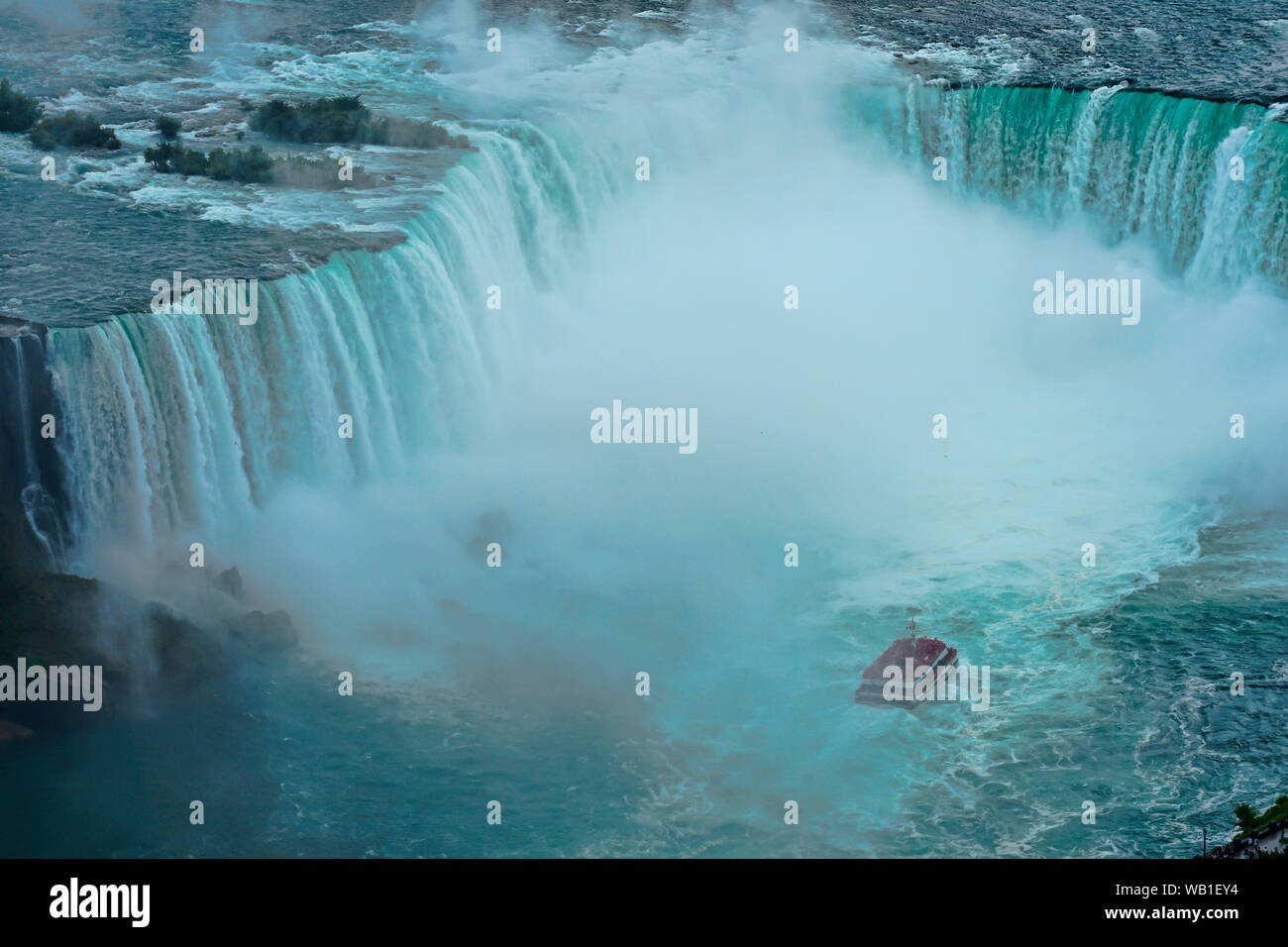 Hornblower Boat at the Niagara Falls in the summer with downtown fun ...