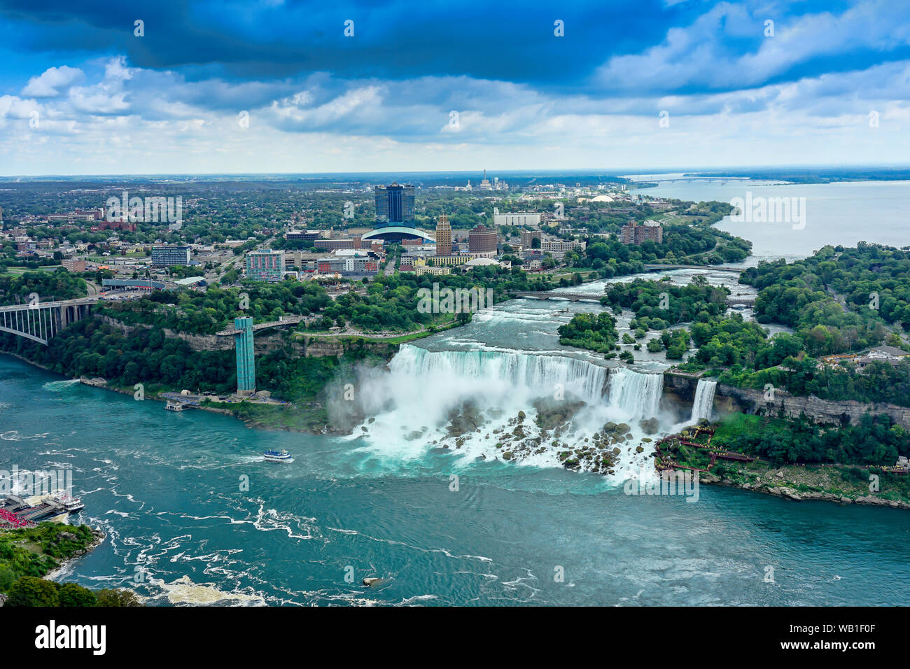Niagara Falls in the summer with downtown fun street and hotel and ...