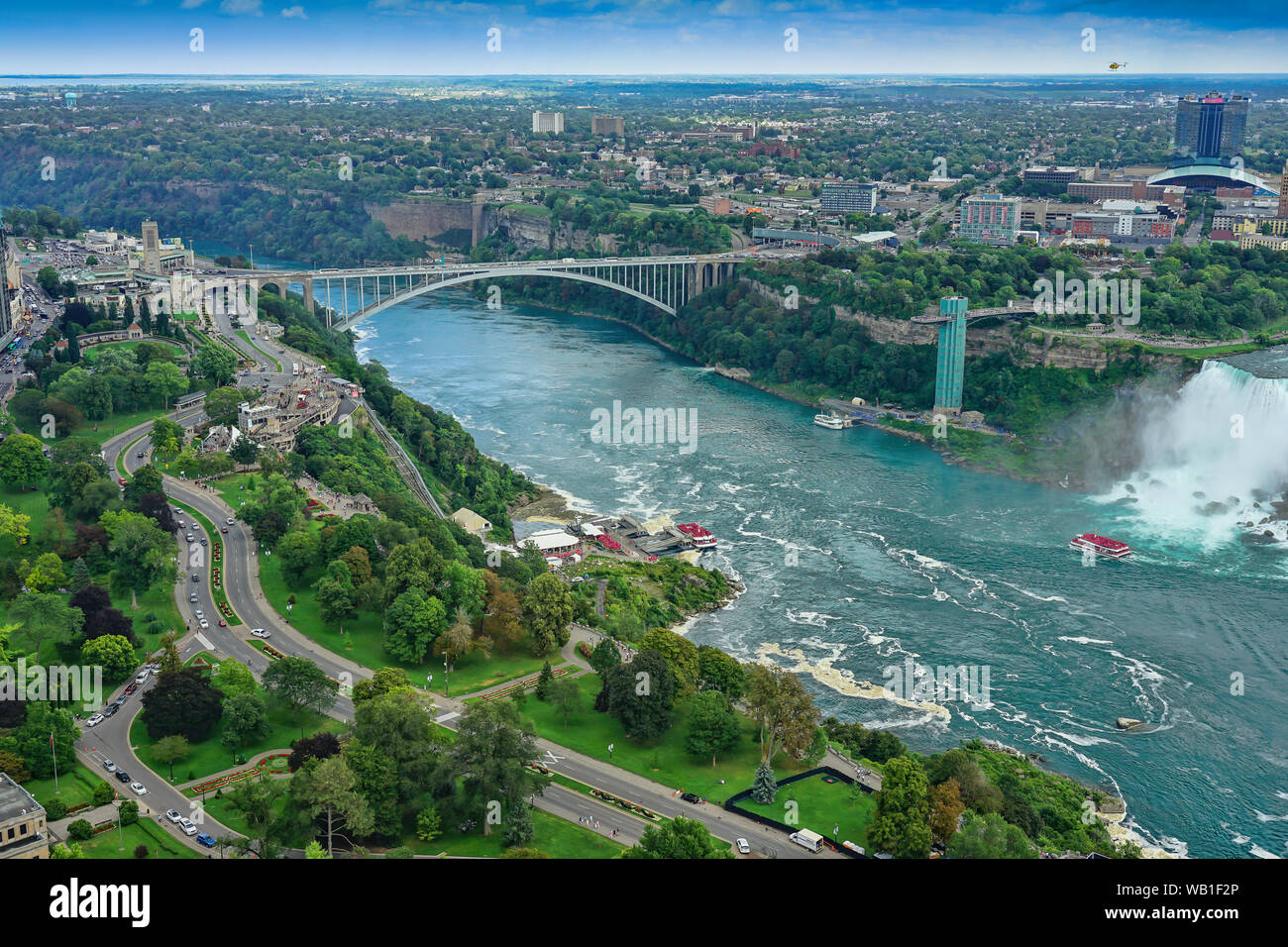 Peace Bridge at Niagara Falls in the summer with downtown fun street ...