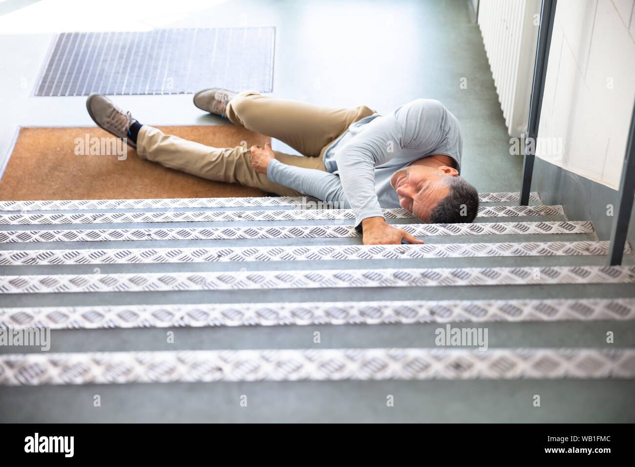 Man Falling Down Stairs Home High Resolution Stock Photography and ...