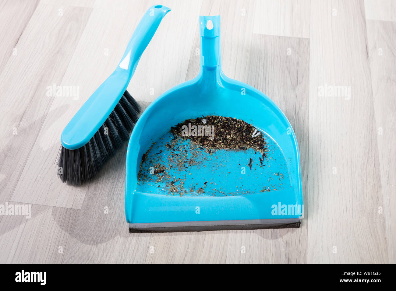 Scoop And Brush Cleaning Kit On The Floor Stock Photo - Alamy