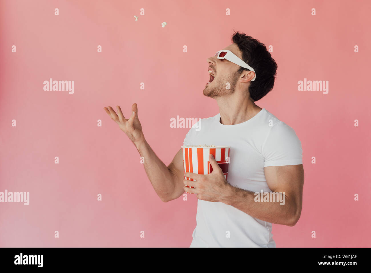 Man Throwing Popcorn High Resolution Stock Photography and Images - Alamy