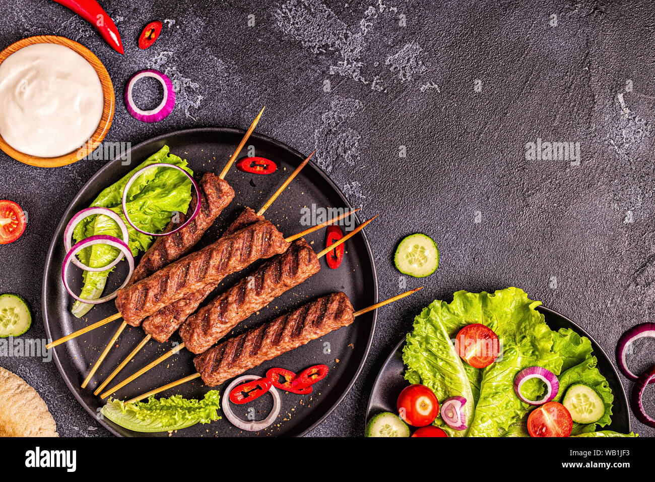 Traditional middle eastern, arabic or mediterranean meat kebab with ...
