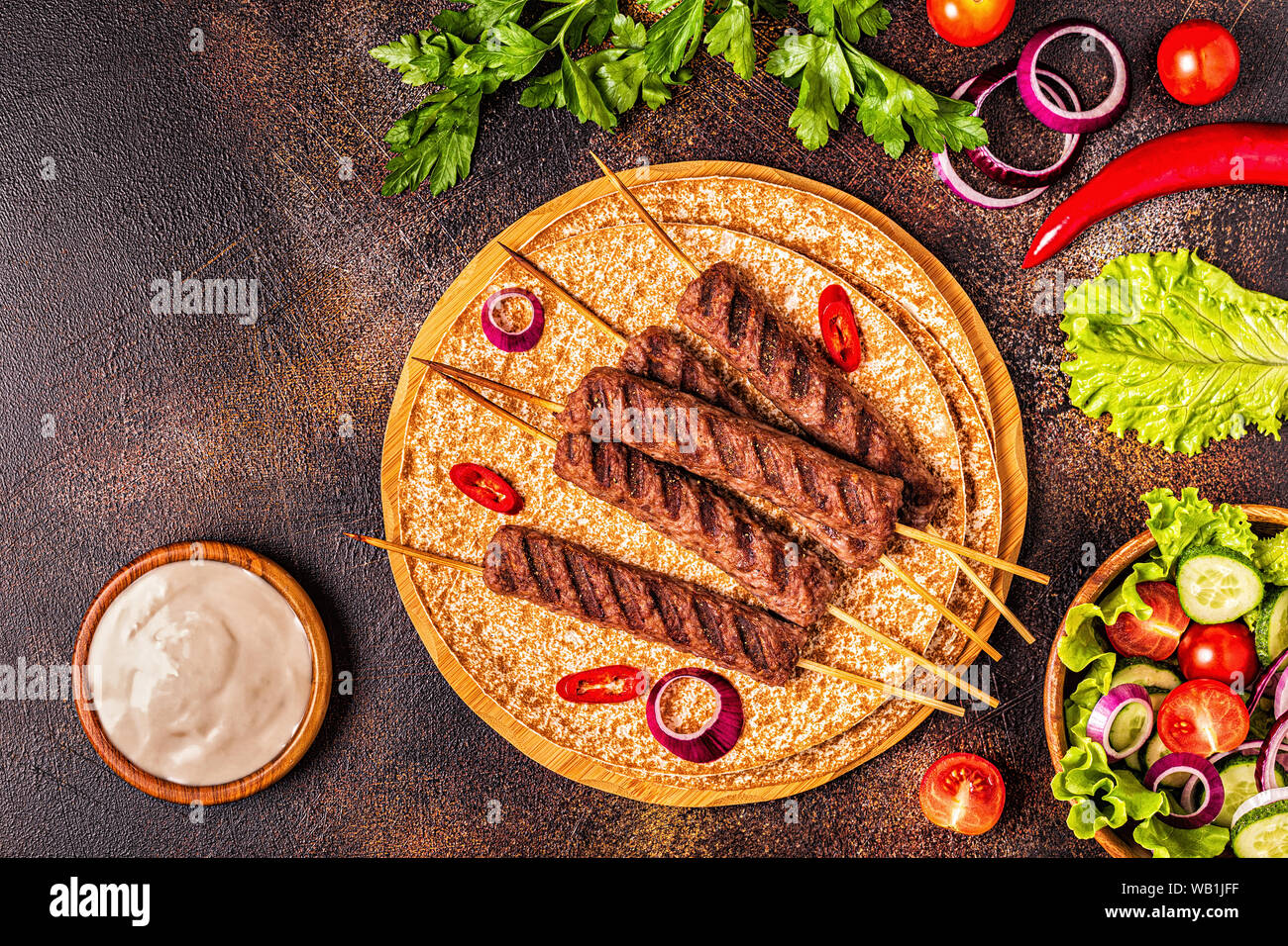 Traditional middle eastern, arabic or mediterranean meat kebab with ...