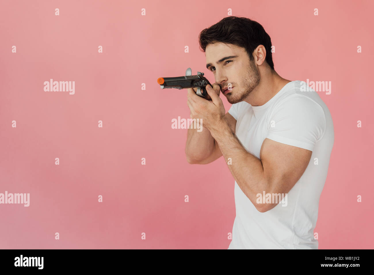 Muscular man gun hi-res stock photography and images - Alamy