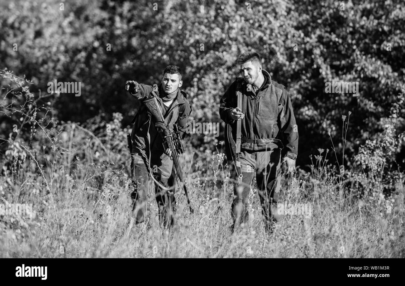 Activity for real men concept. Hunters gamekeepers looking for animal ...