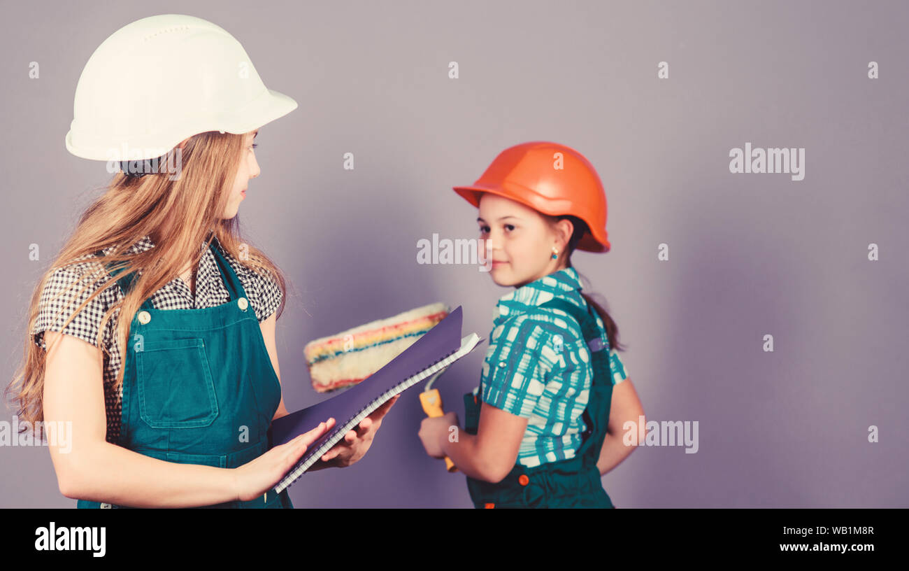 Home improvement activities. Kids girls planning renovation. Repaint ...