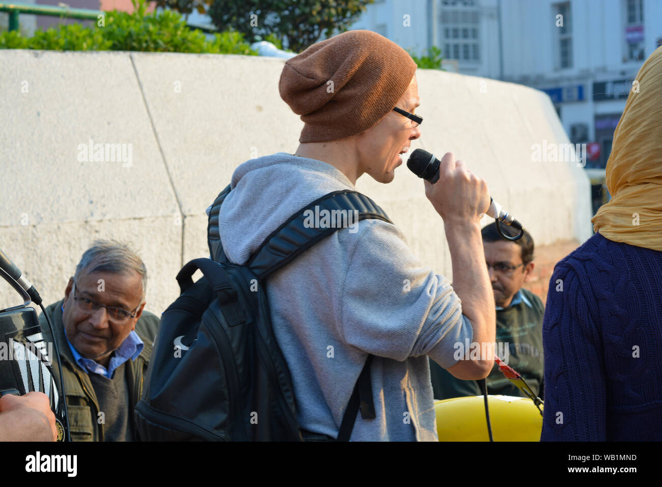 Iskcon temple devotees singing of hymns in praise of Lord krishna Stock ...