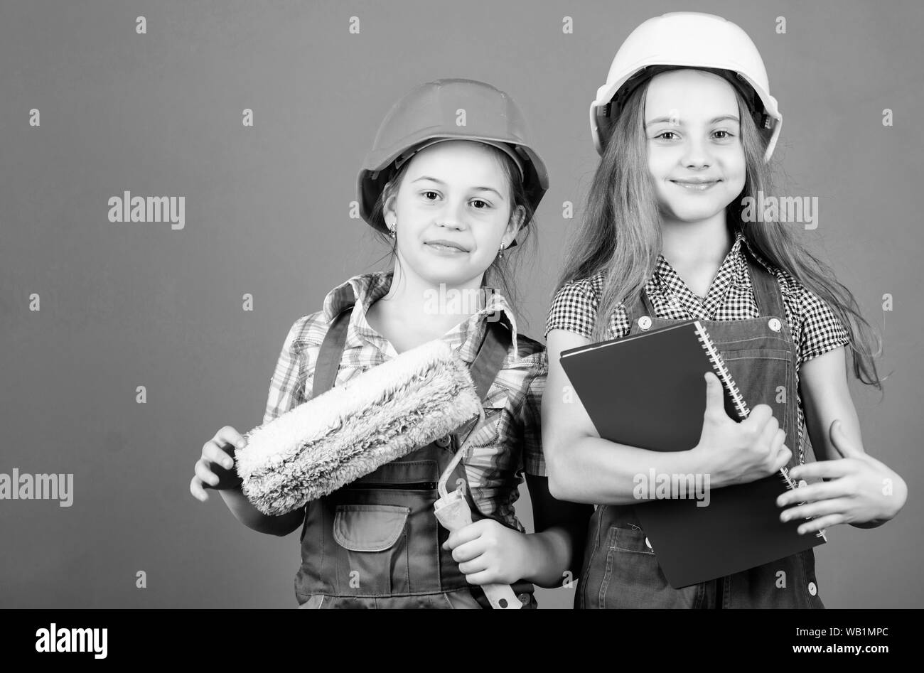 Foreman inspector. Repair. small girls repairing together in workshop ...