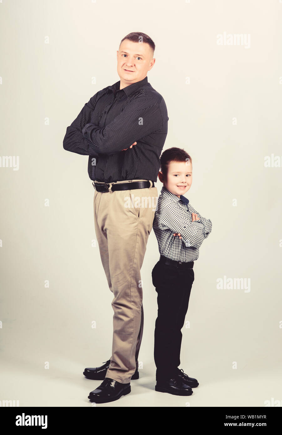 team work. happy child with father. business partner. childhood ...