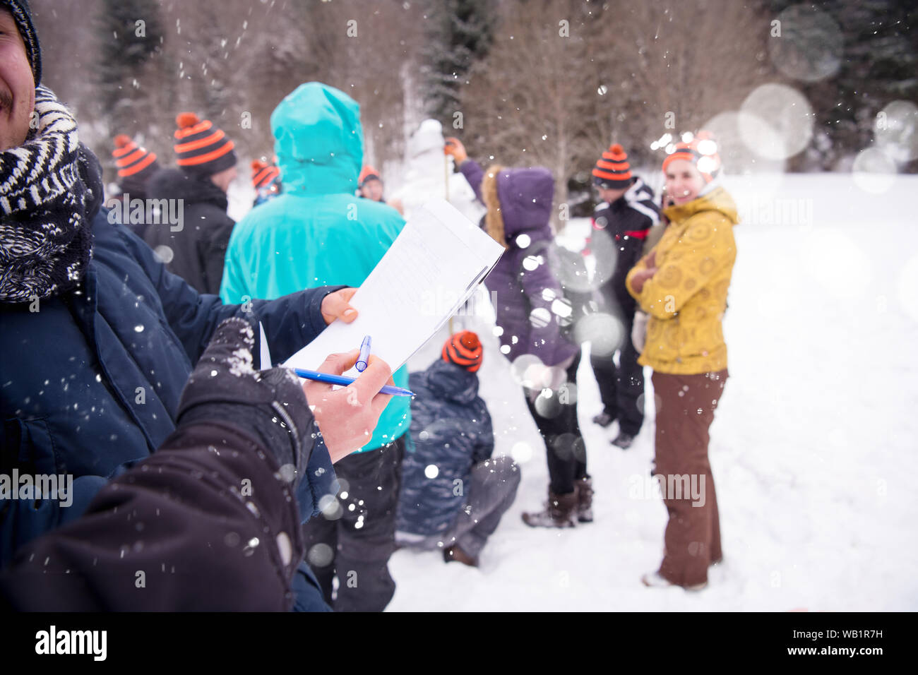 group of young happy business people after a competition measuring the ...