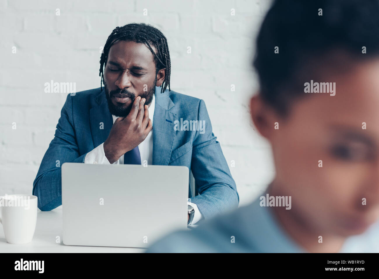 Toothache african businessman tooth pain hi-res stock photography and ...