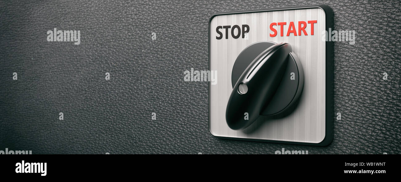 Start switch turning on retro old round on black leather background ...