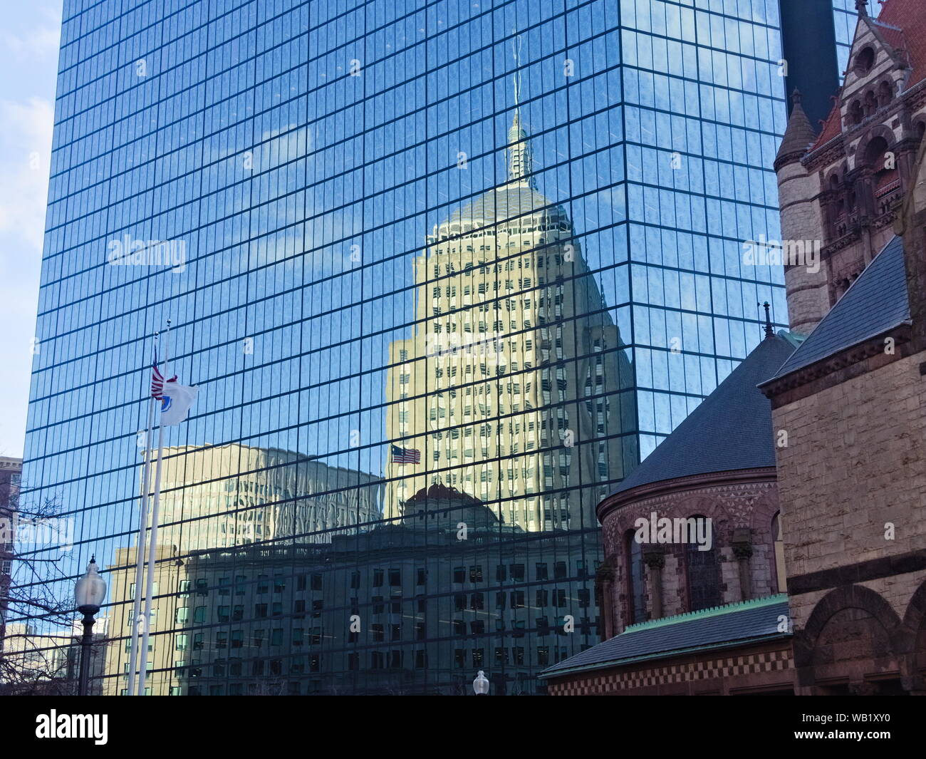 The reflection of the old John Hancock Building on the new John Hancock ...