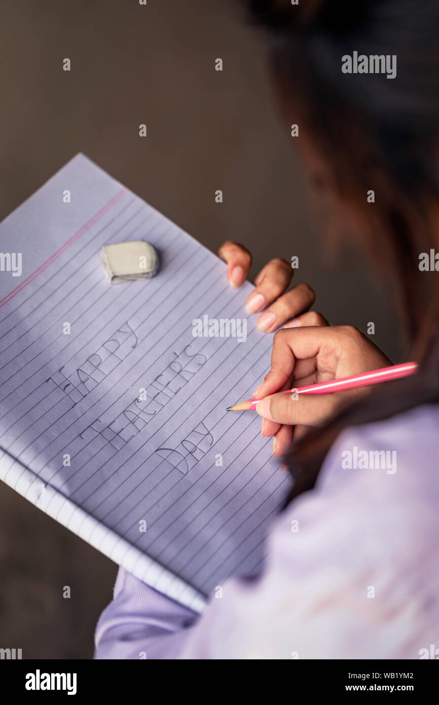 Indian girl writing hi-res stock photography and images - Alamy