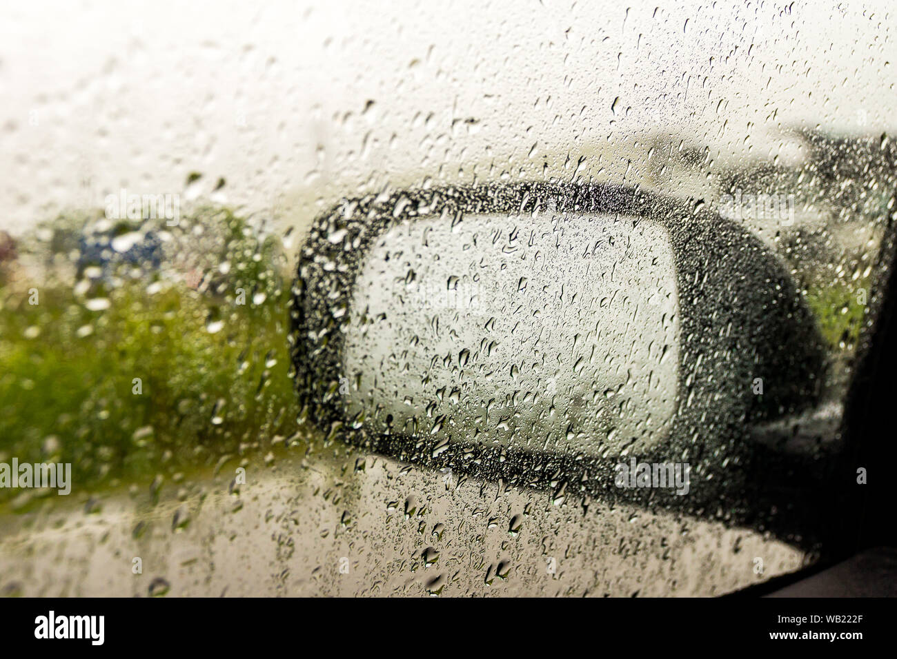 rain outside the car window, mirror in a rain Stock Photo - Alamy