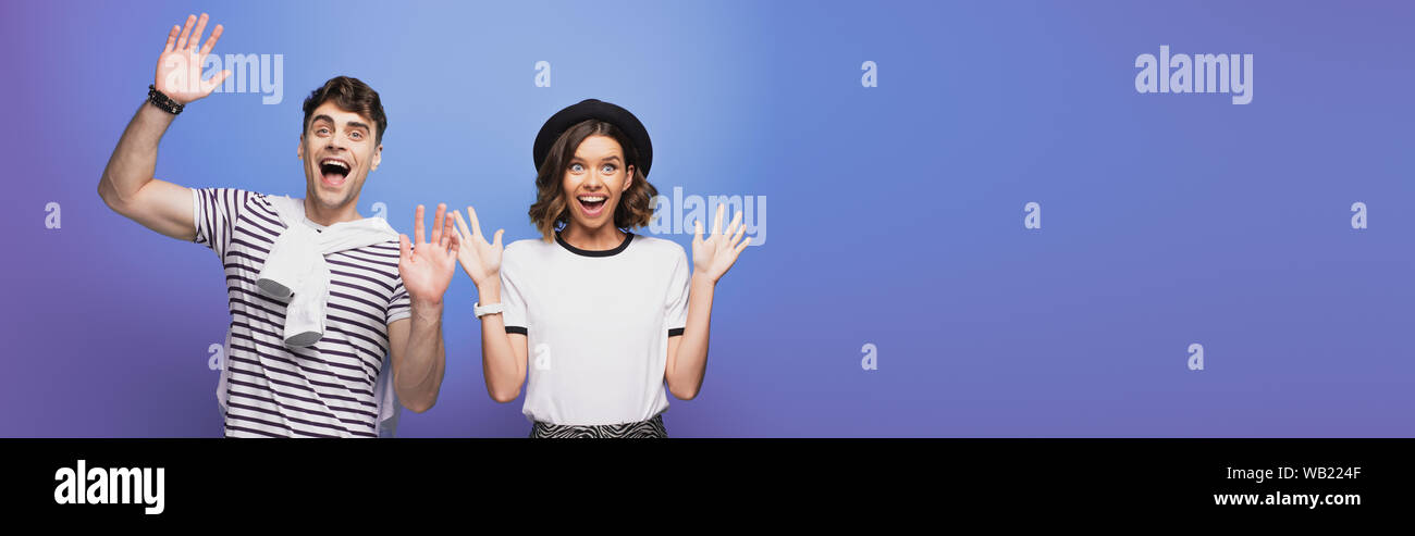 Excited woman greeting waving hand hi-res stock photography and images ...