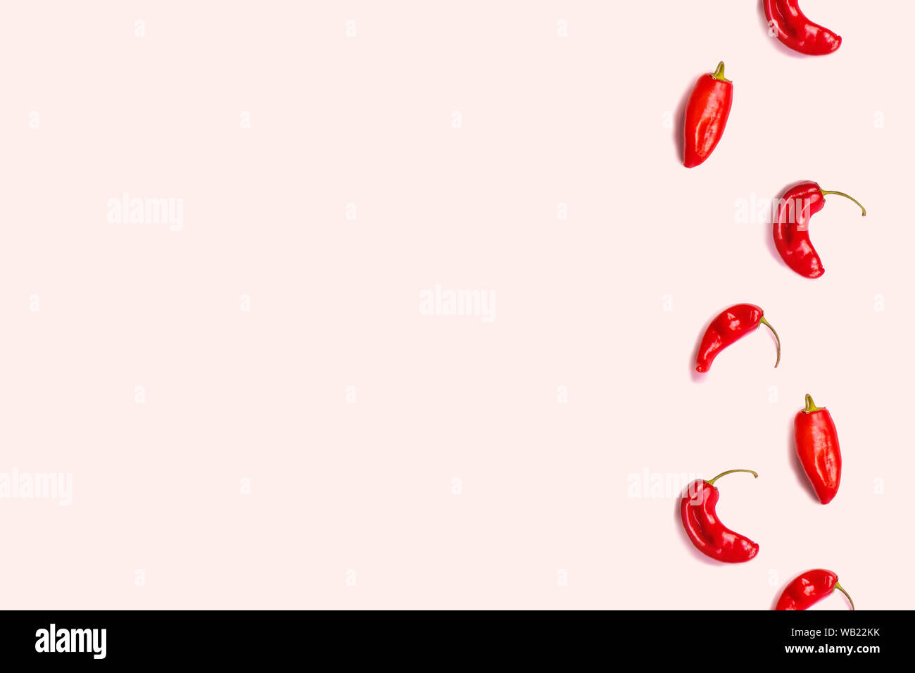 Minimal food concept. Creative layout of chili pepper on pink ...