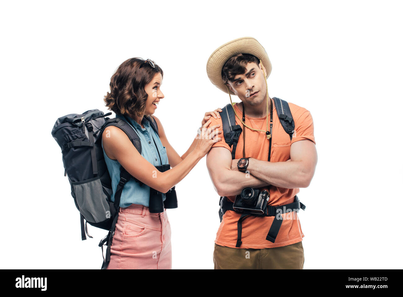 cheerful young woman touching shoulder of thoughtful boyfriend isolated ...