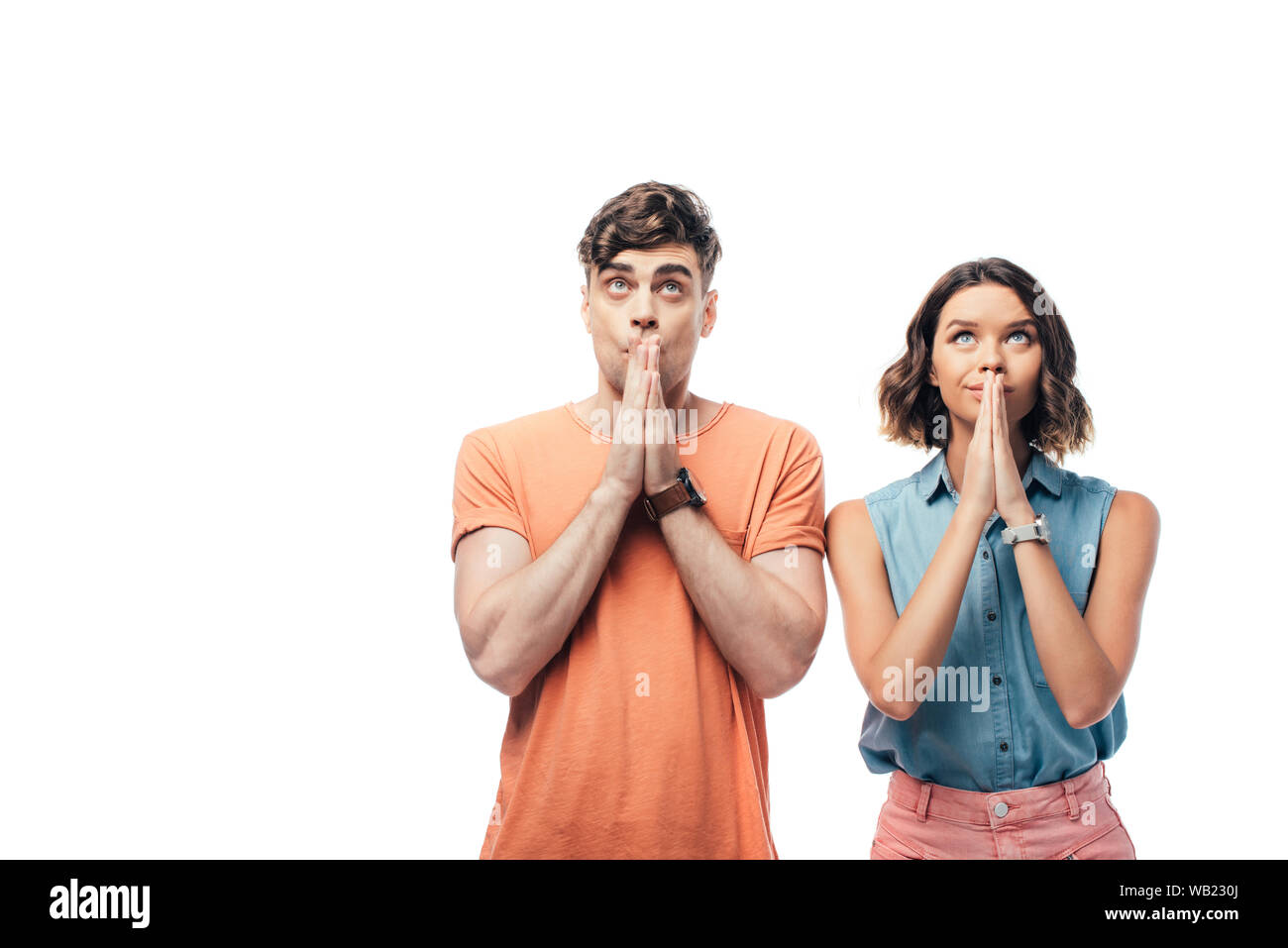 hoping man and woman looking up and showing pray gestures isolated on ...