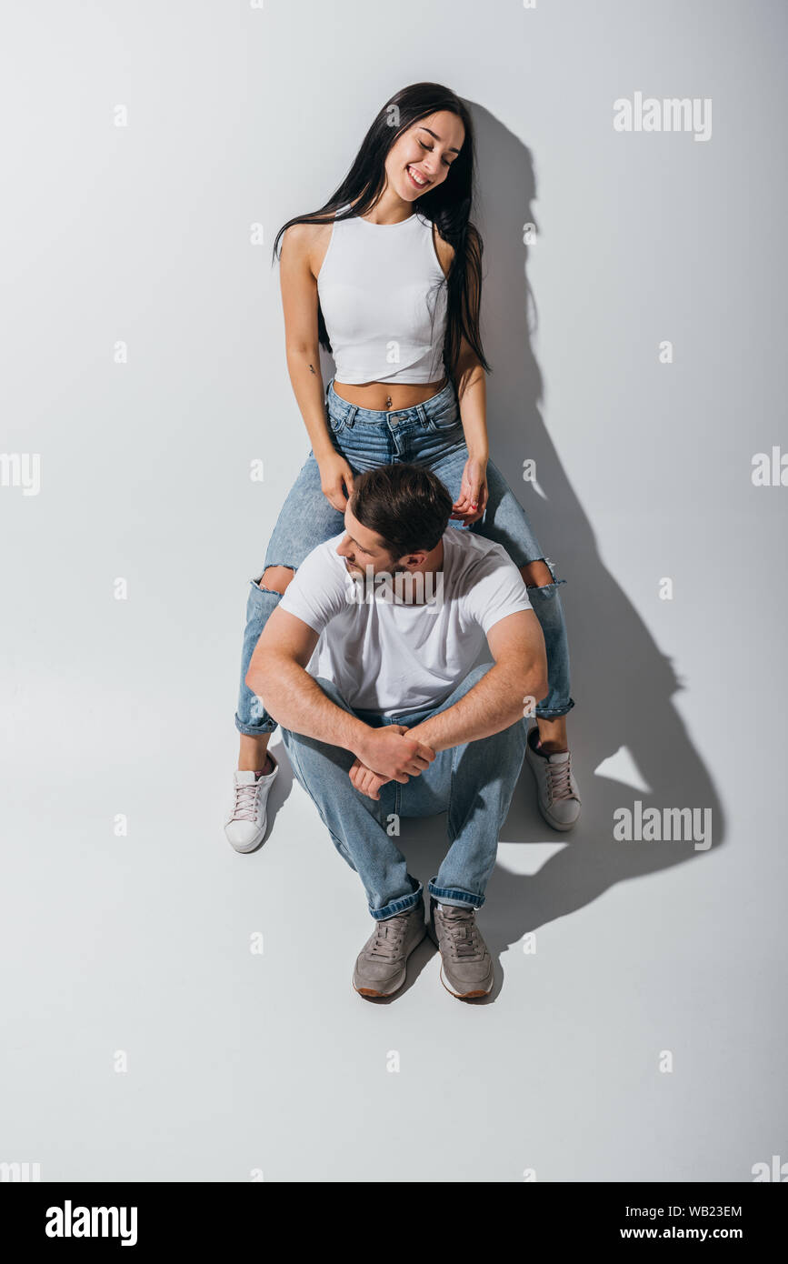 Girl sitting on shoulders hi-res stock photography and images - Alamy