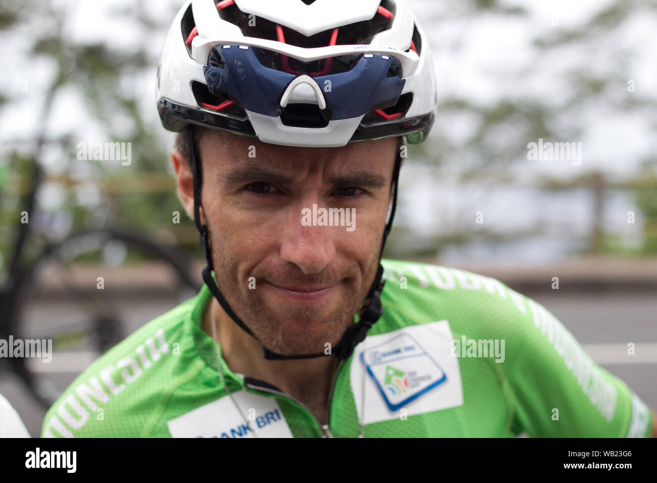 Rider of Kinan Cycling Team, Thomas Lebas (FRA) looks at the camera ...
