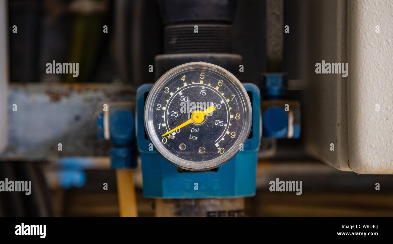 High pressure manometers, pipelines and valves, blur industrial ...