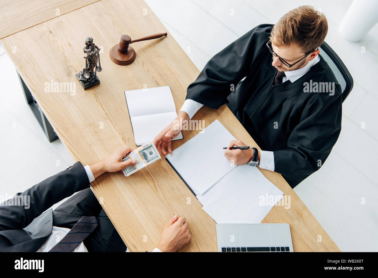 Judge gavel papers sitting hi-res stock photography and images - Alamy