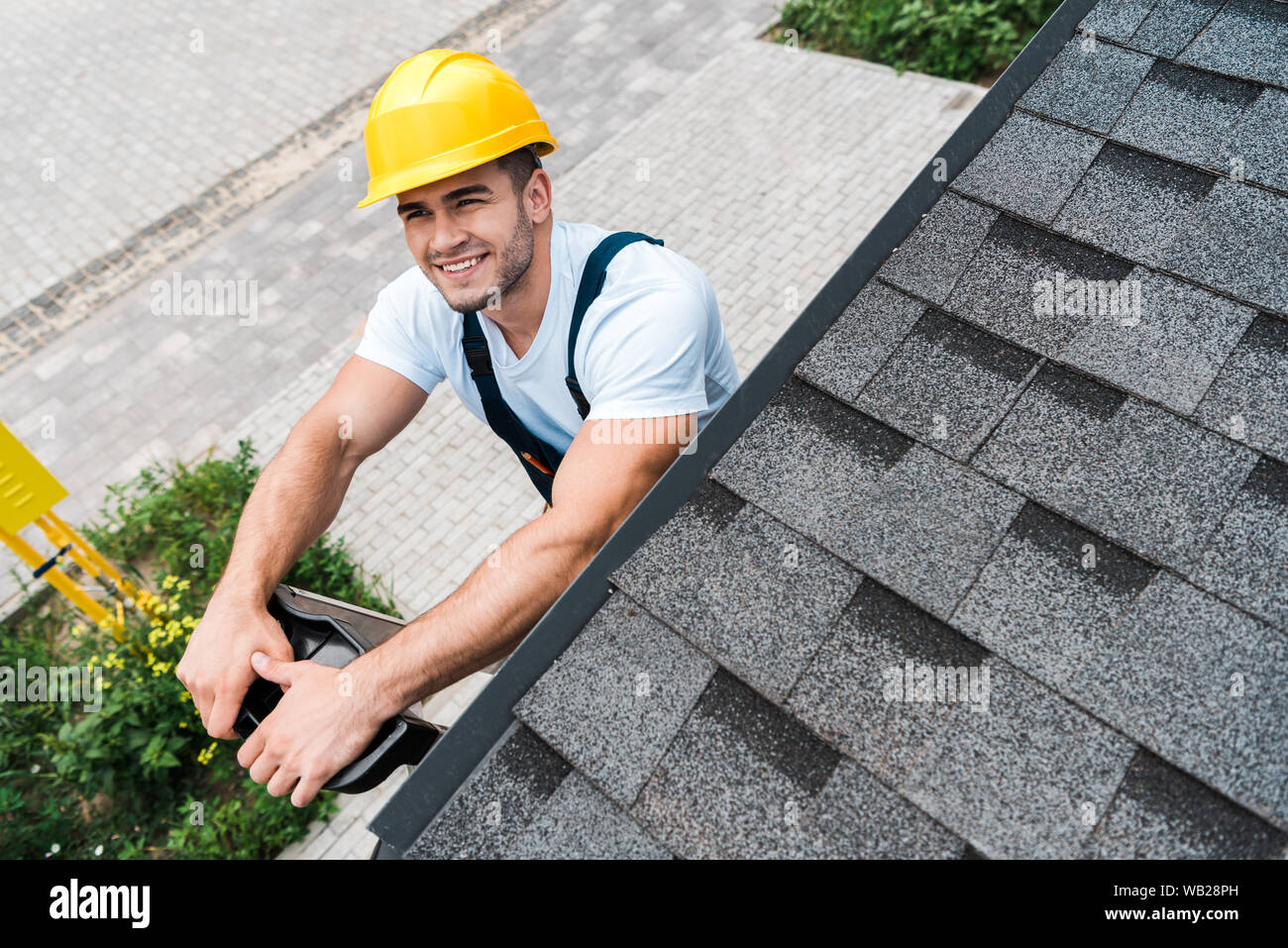 Overhead view worker holding hi-res stock photography and images - Alamy