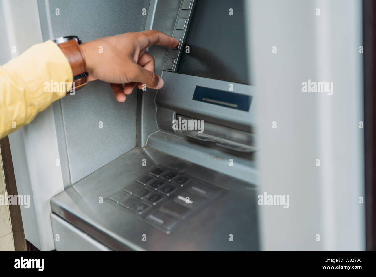 Man pressing buttons on machine hi-res stock photography and images - Alamy
