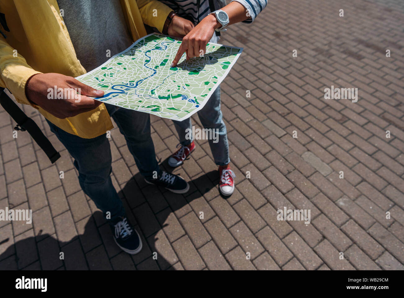 Finger pointing route on map hi-res stock photography and images - Alamy
