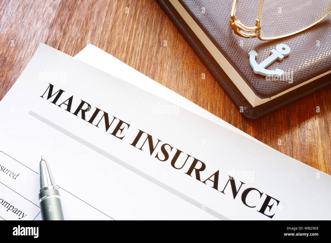 Marine insurance application. Papers on the office desk Stock Photo - Alamy
