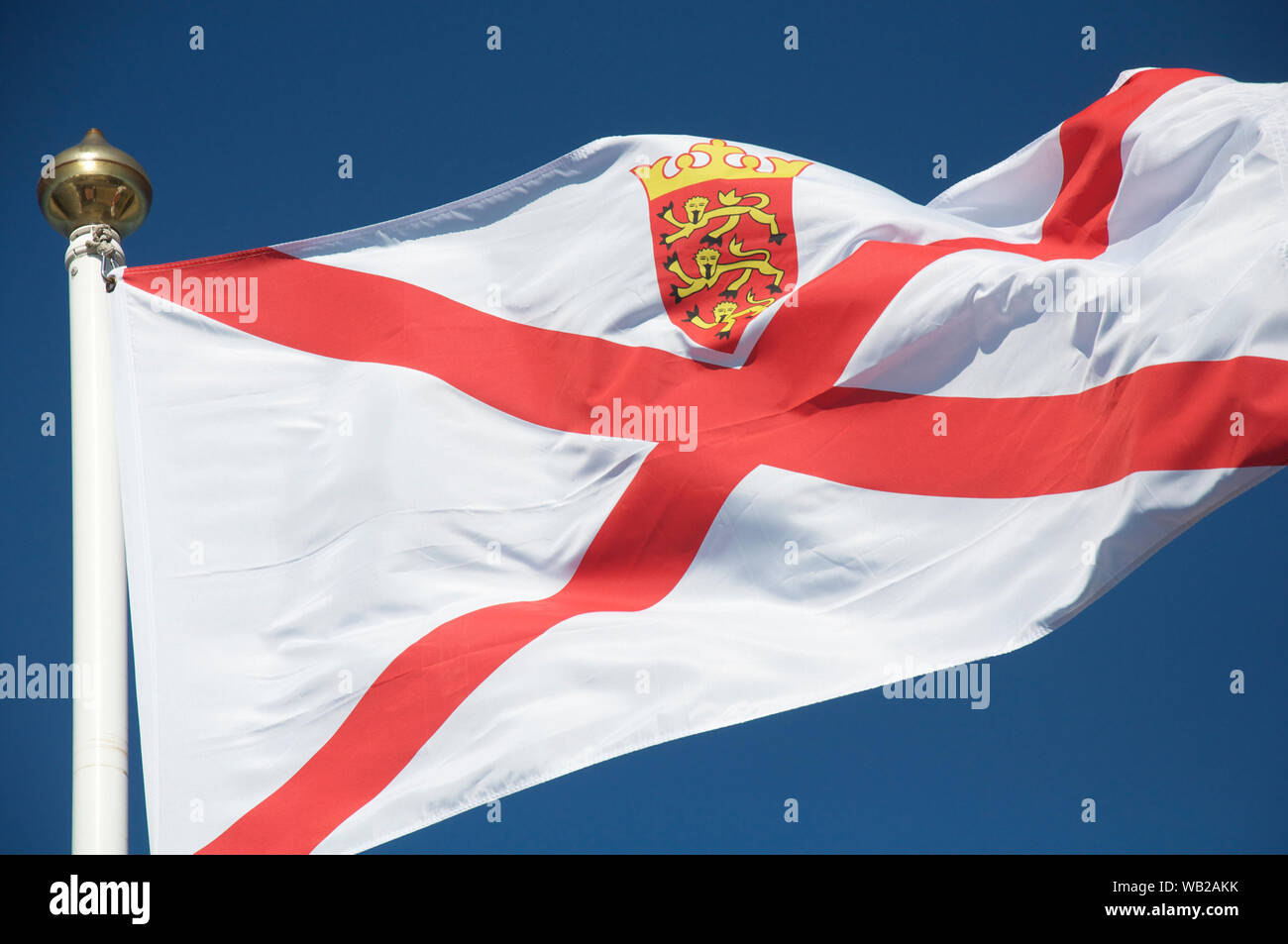 White flag with diagonal red cross hi-res stock photography and images ...