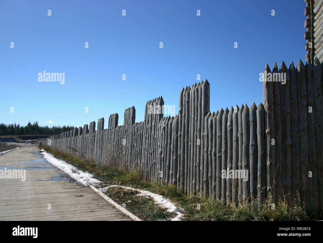 Ancient authentic fence made of wooden stakes. The prospect for the ...