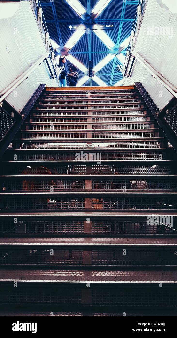 Vertical low angle shot of stairs inside of a building Stock Photo - Alamy