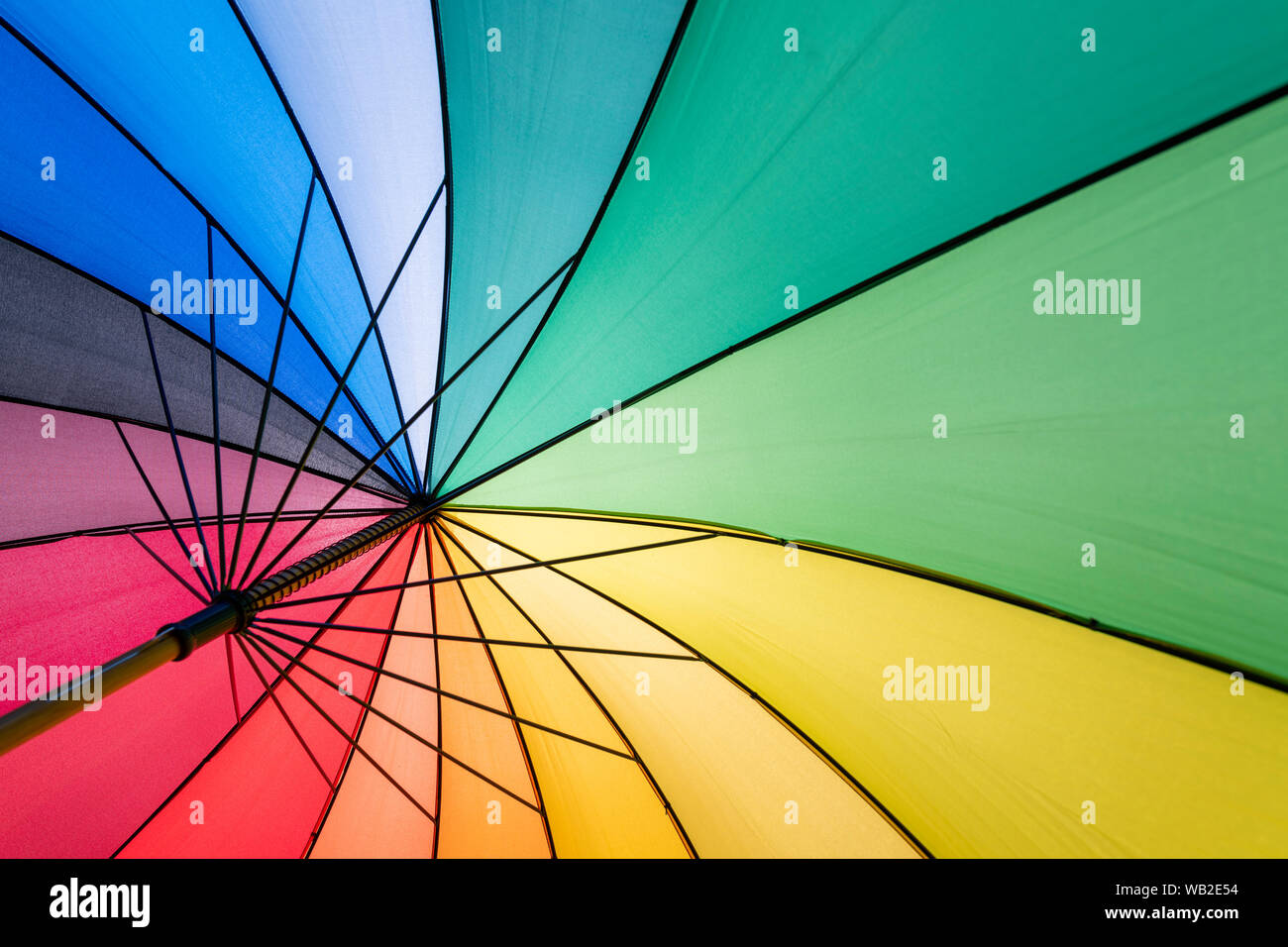 Colorful parasol in summer with backlight Stock Photo - Alamy