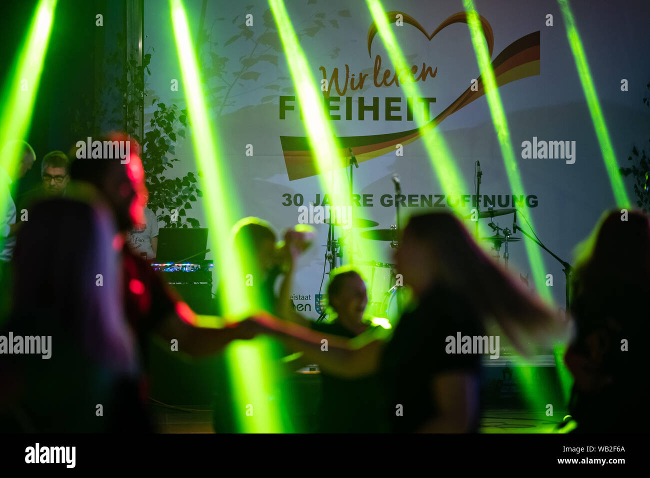 Geisa, Germany. 23rd Aug, 2019. Guests dance at a cross-border fair of ...