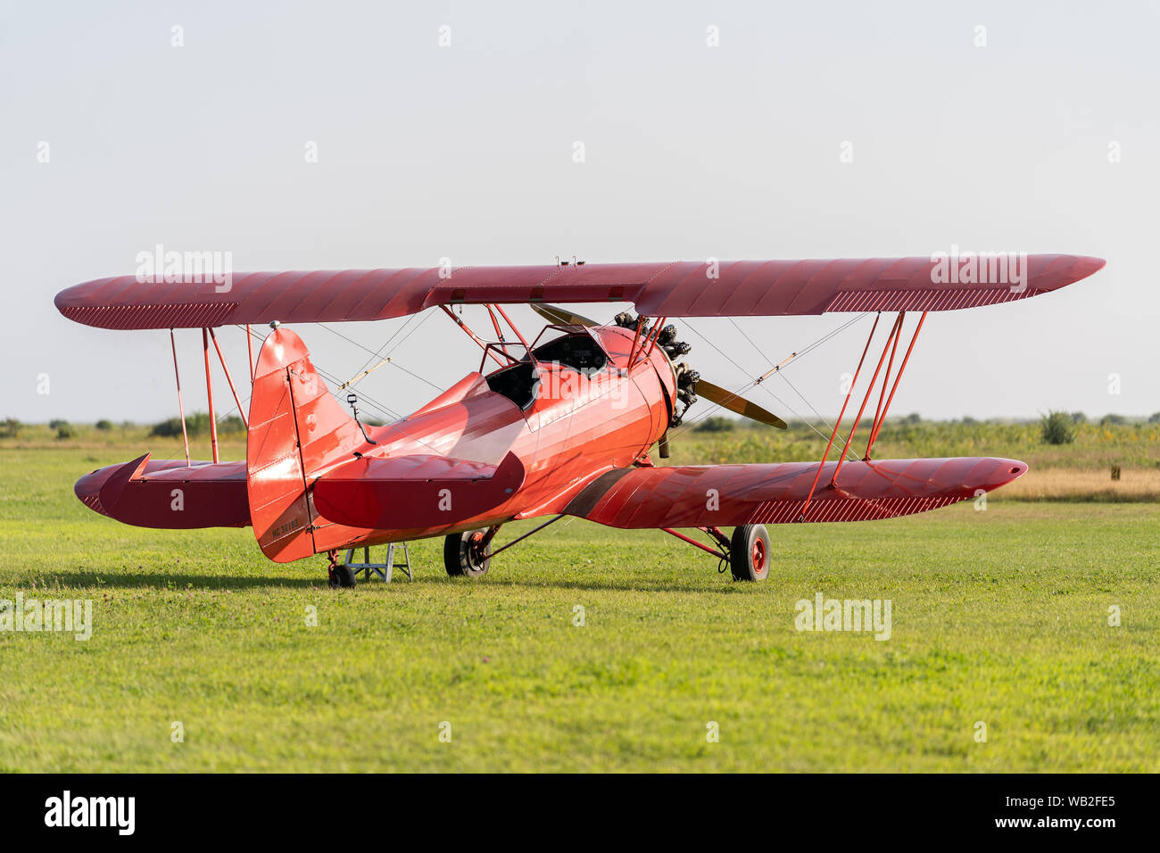 Red bi wing plane flying hi-res stock photography and images - Alamy