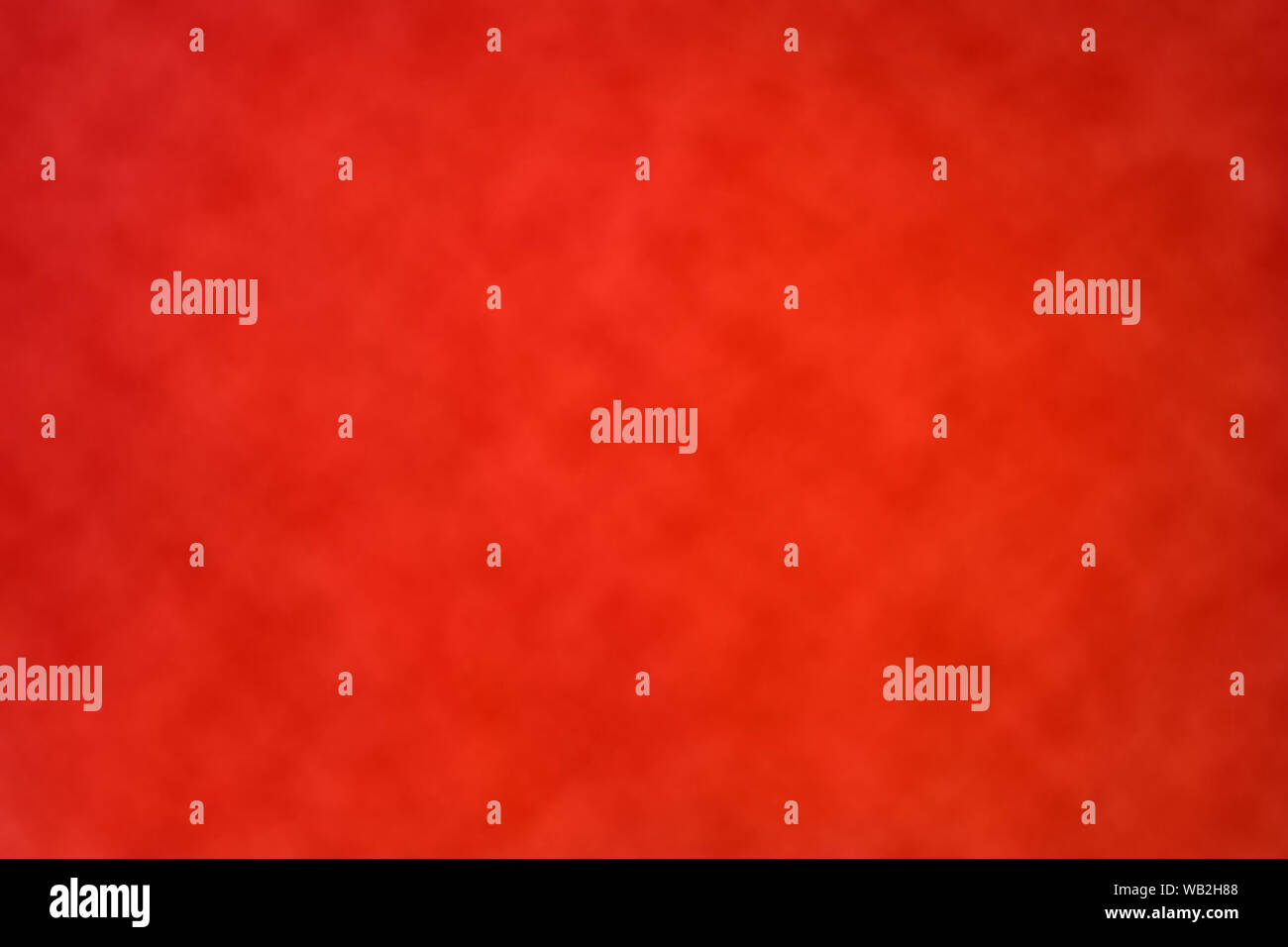 Bright red muslin backdrop painted with hand Stock Photo - Alamy