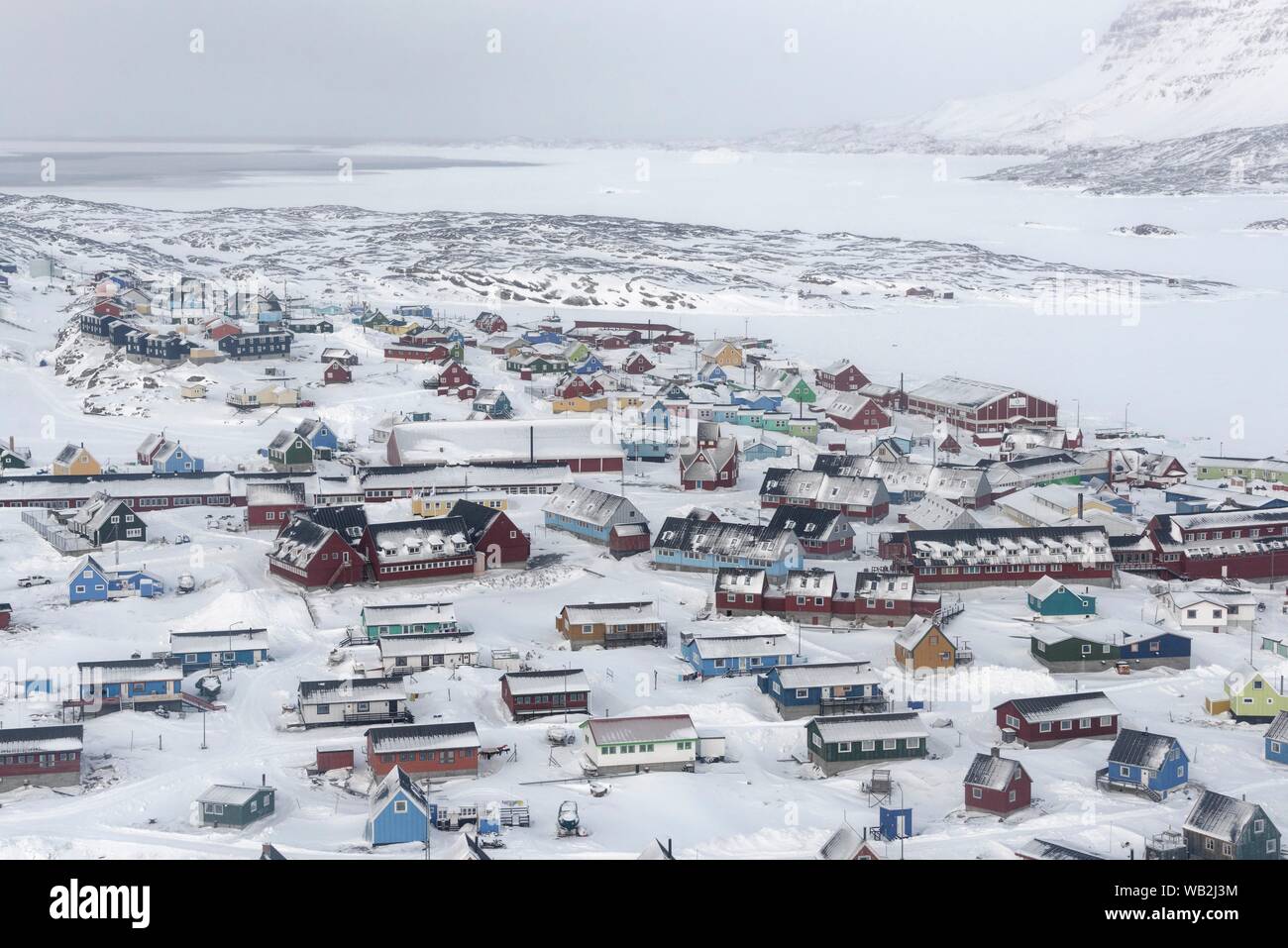 View in winter to the colourful houses of Qeqertarsuaq, Disco Island ...