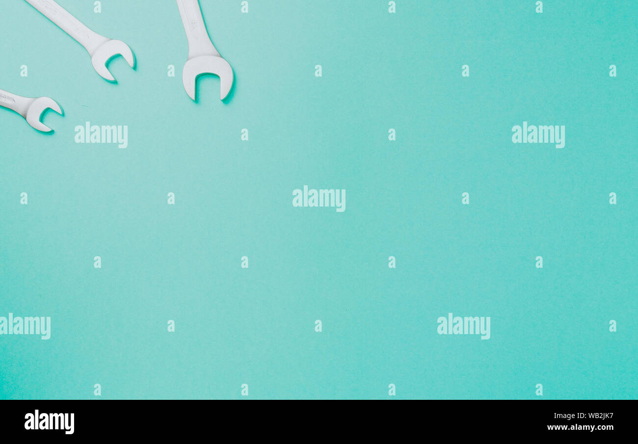 New spanner tools isolated on electric green background. Flat layout ...