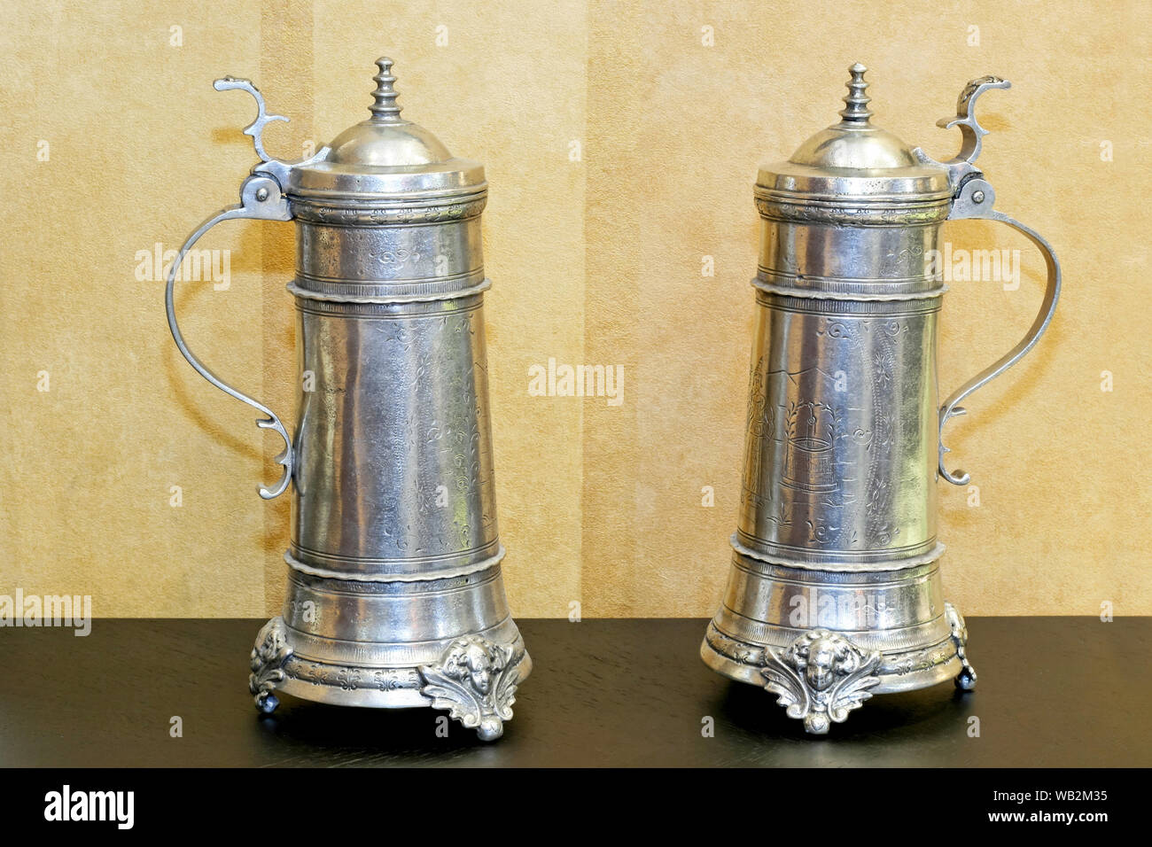 Pair of ancient mugs made from iron Stock Photo - Alamy