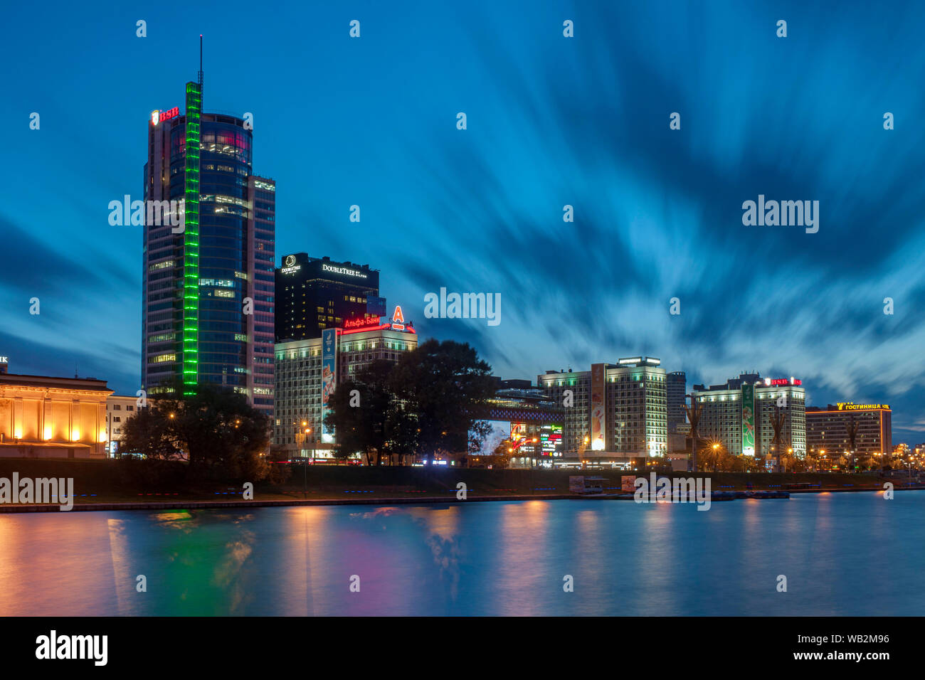 Dusk view of the Minsk skyline seen across the Svislach River (Raka ...