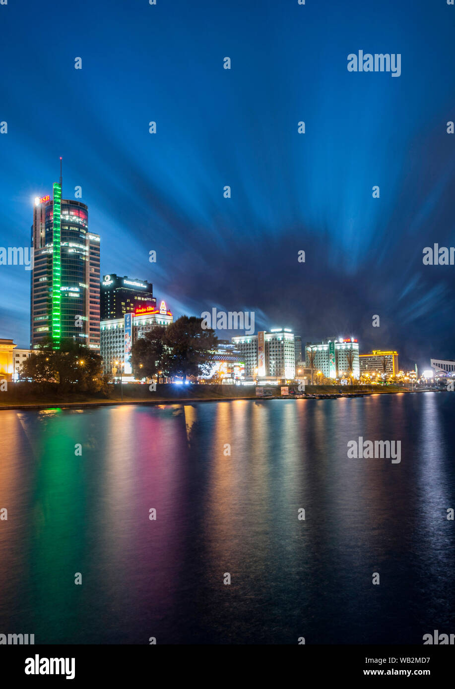 Dusk view of the Minsk skyline seen across the Svislach River (Raka ...