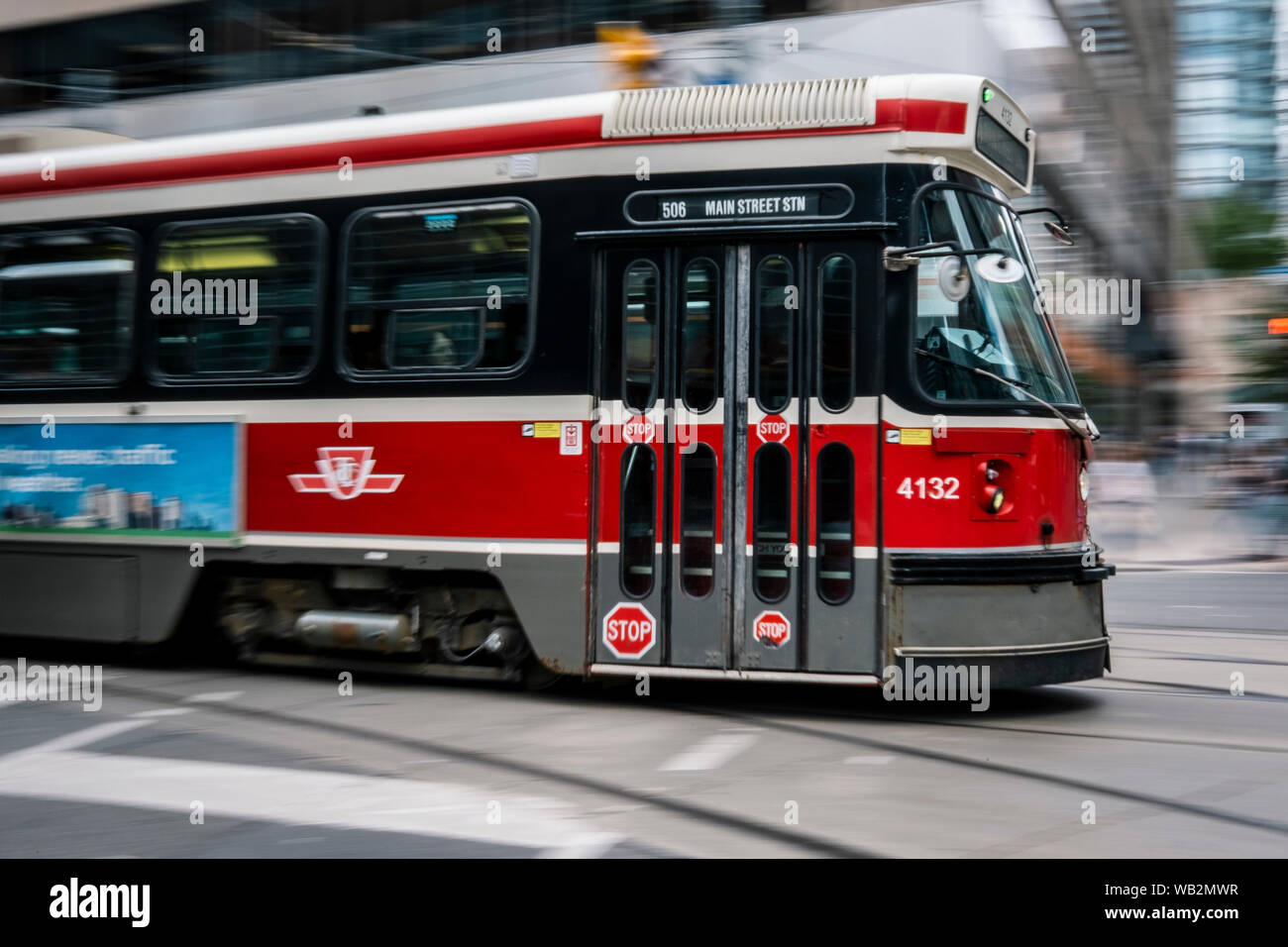 A red tram in downtown Toronto, Canada Stock Photo - Alamy