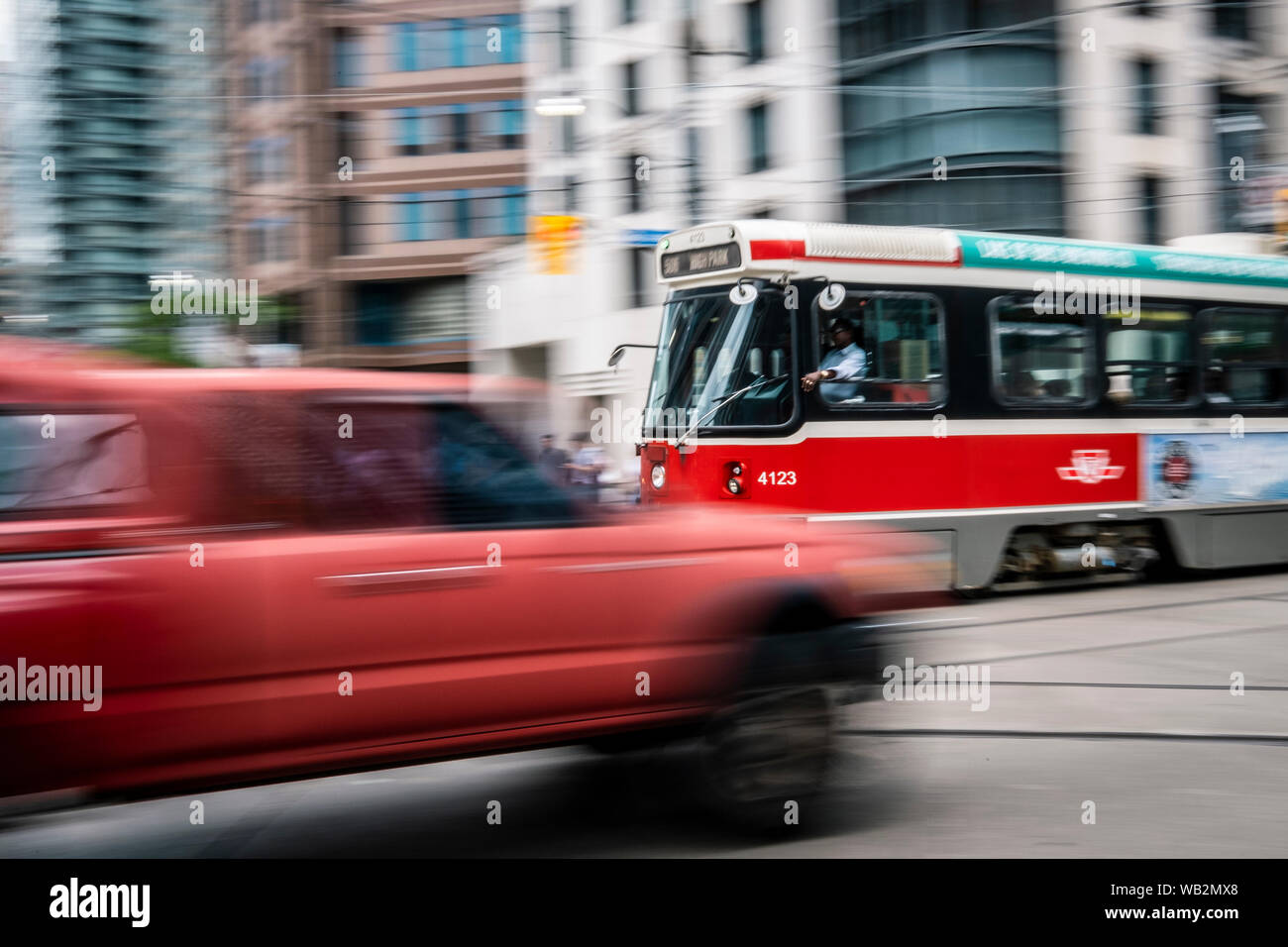 A red tram in downtown Toronto, Canada Stock Photo - Alamy