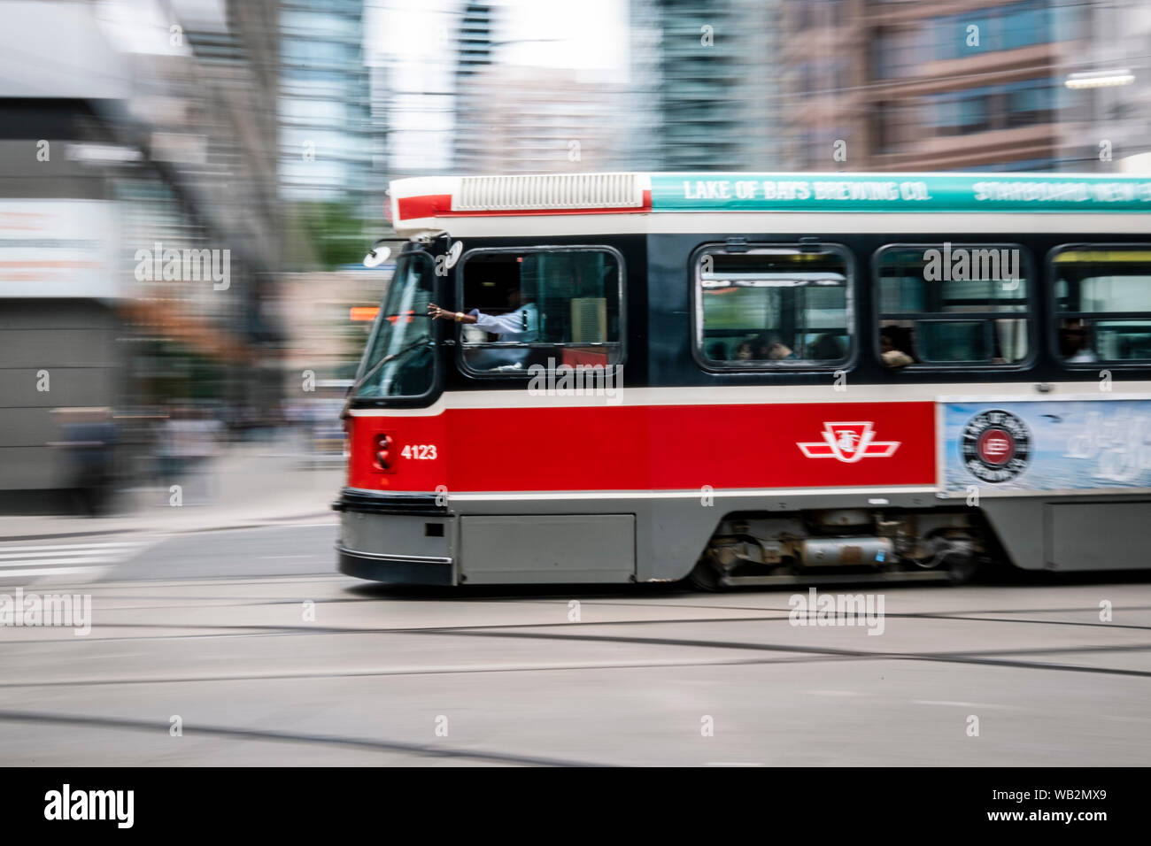 A red tram in downtown Toronto, Canada Stock Photo - Alamy