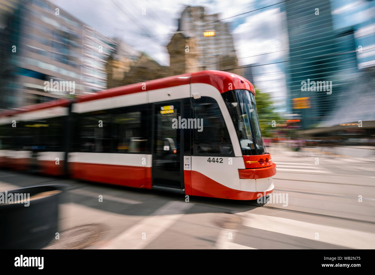 A red tram in downtown Toronto, Canada Stock Photo - Alamy